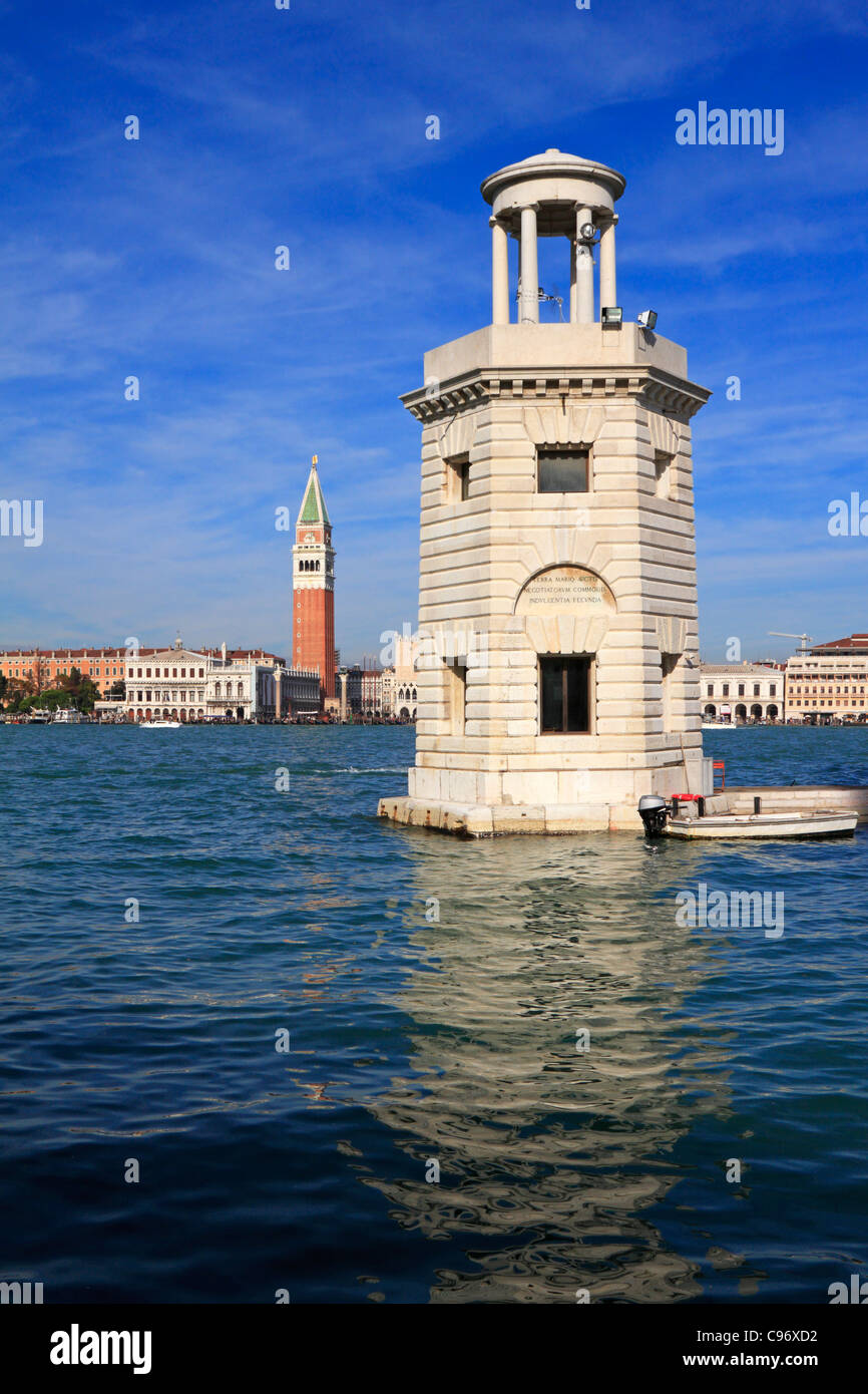 Lighthouse at the entrance to the San Giorgio basin with St Mark's ...