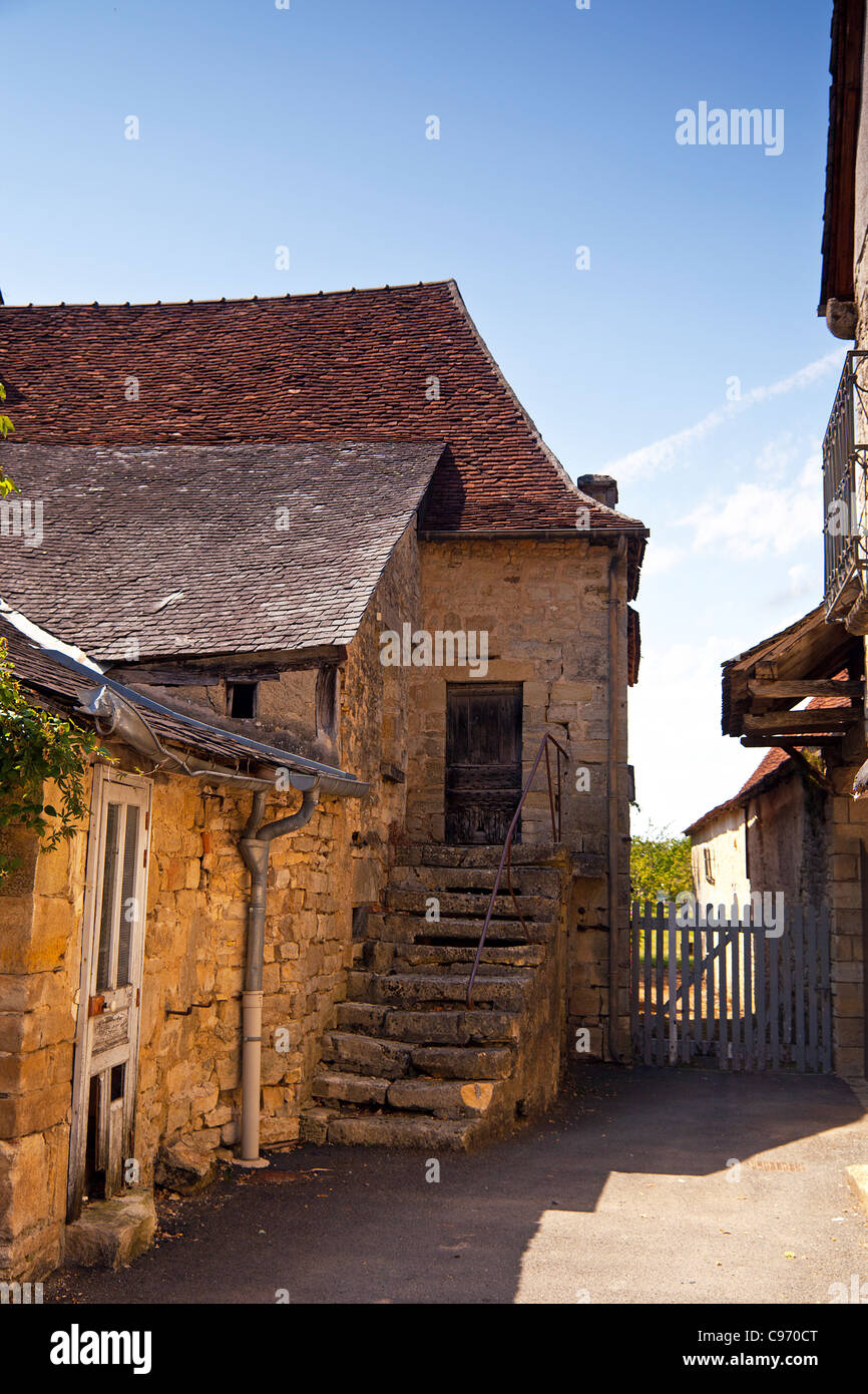 Stone steps up to entrance to Medieval freestone house in Saint-Robert ...