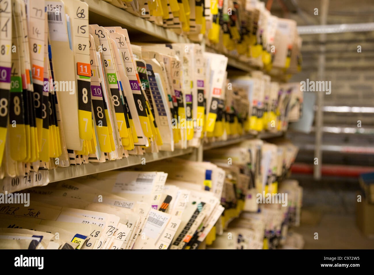 Patient paper medical hospital records filed in hospital archives ...