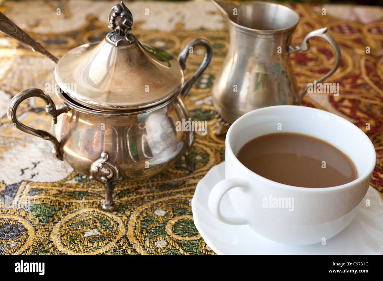 Serving coffee with milk and sugar Stock Photo - Alamy