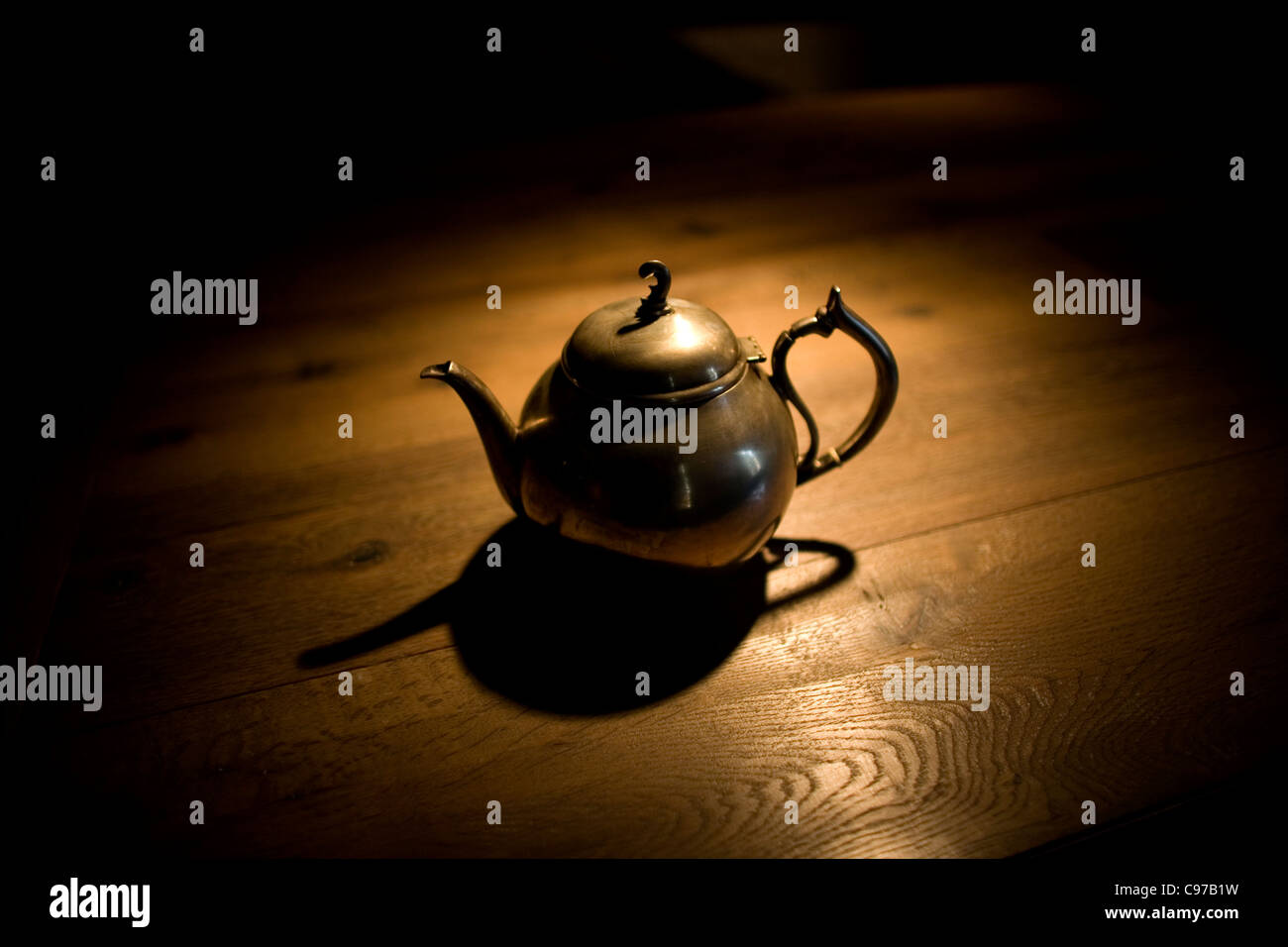 A teapot decorates a dining room designed by Habitacion 116 during the ...