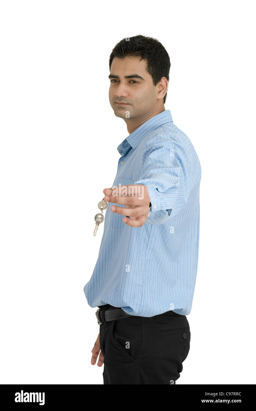 man dropping keys Stock Photo - Alamy