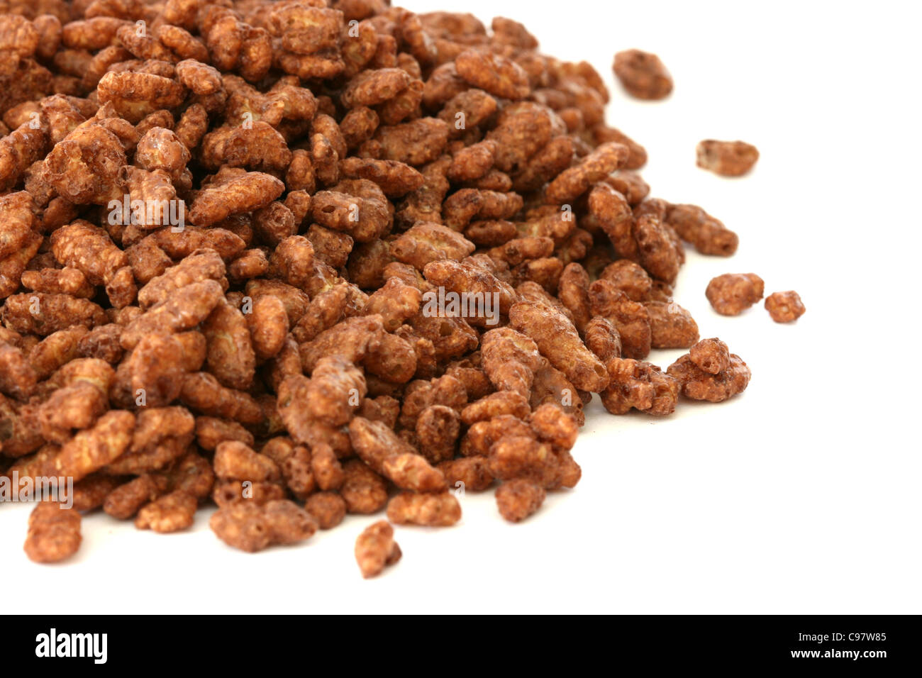 Chocolate popped rice cereals on white background Stock Photo - Alamy