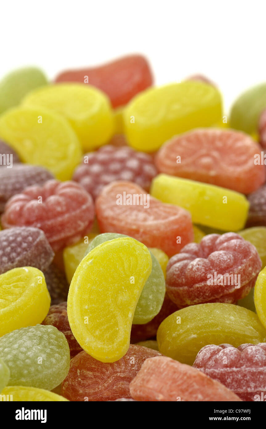 colorful fruit flavored candies assortment on a white background Stock ...