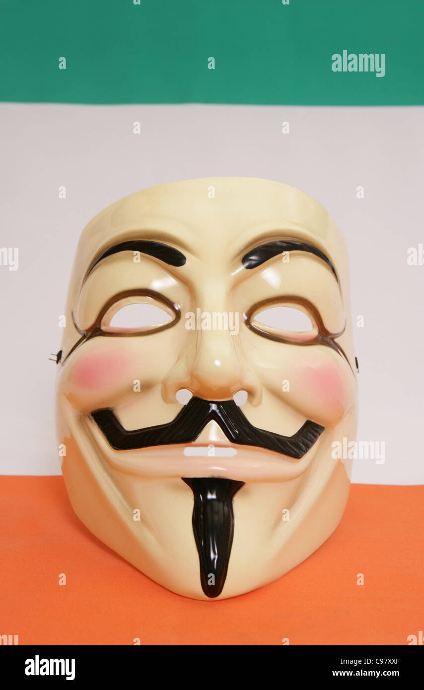 Guy fawkes mask on irish flag Stock Photo - Alamy
