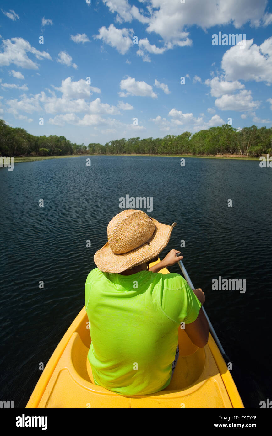 Man canoeing on Annaburroo Billabong, Kakadu National Park, Northern ...