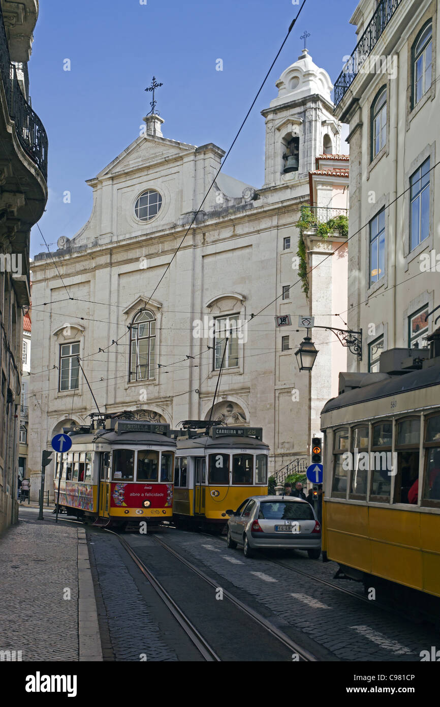 Lisbon Trams and Church Stock Photo - Alamy