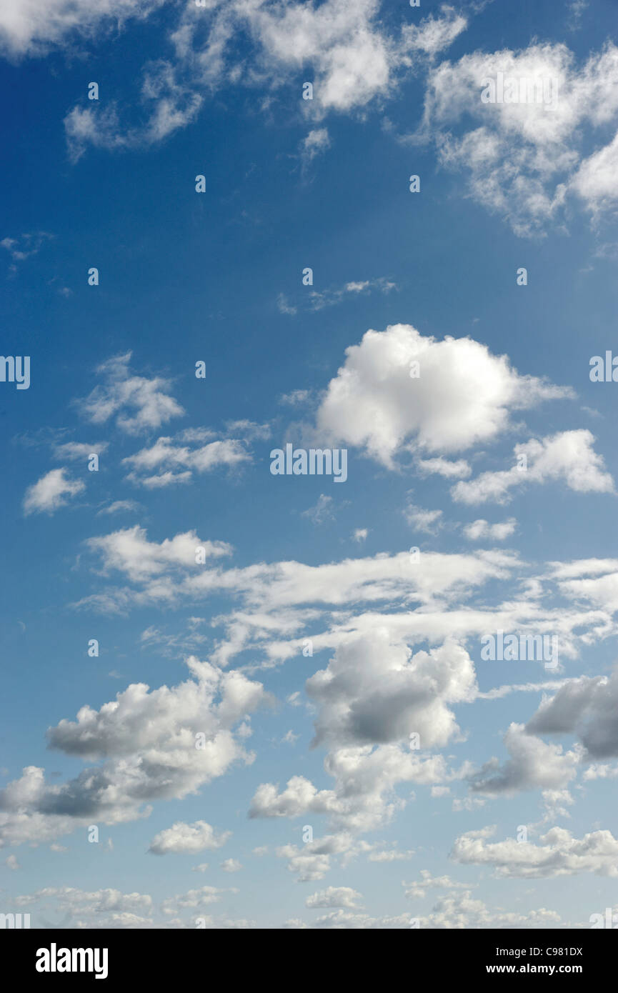 Cloud filled blue sky Stock Photo - Alamy