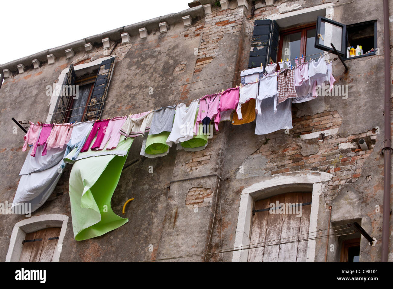 Washing hanging outside an old building in Venice Stock Photo - Alamy