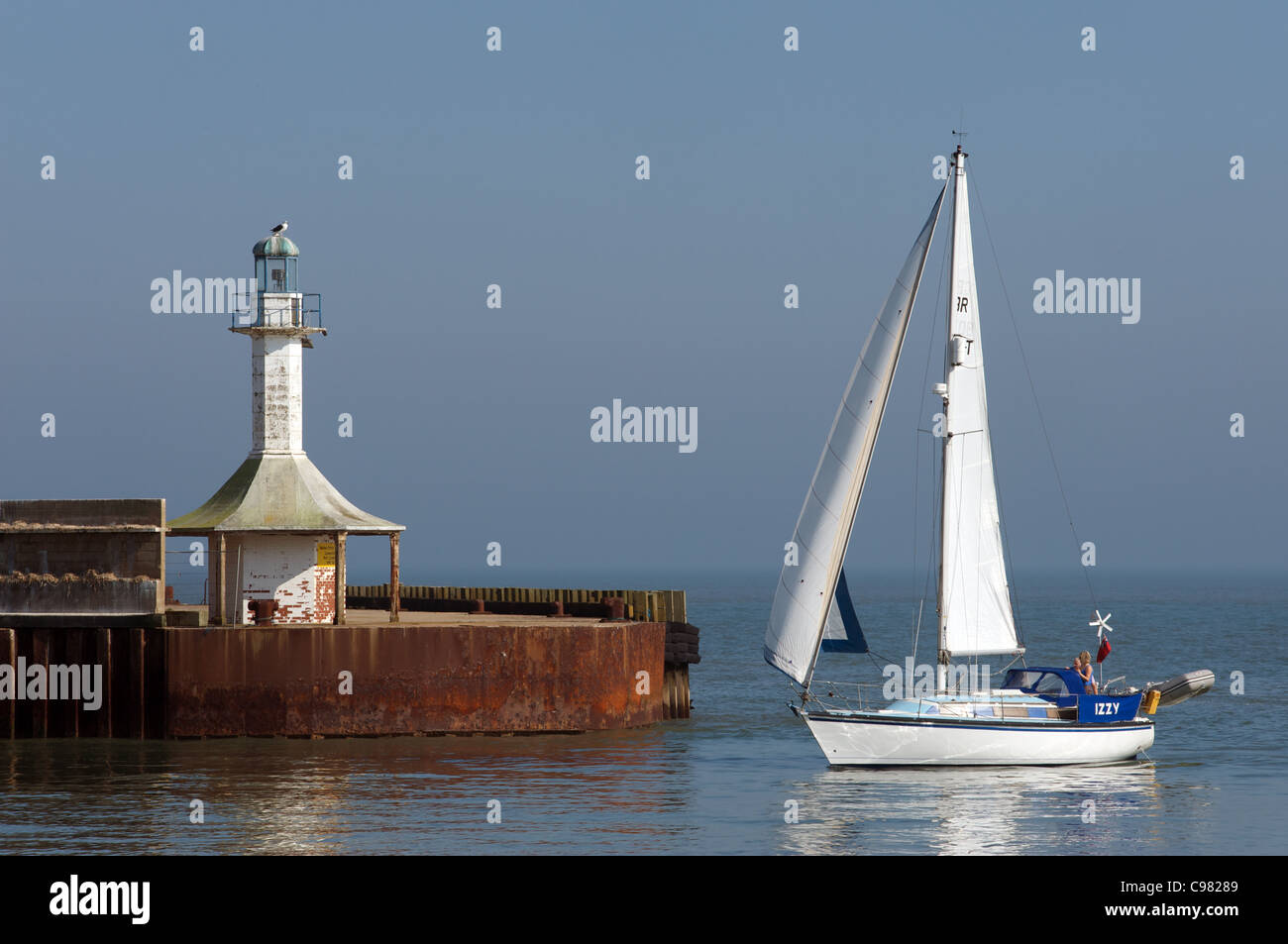 Yacht sailing into the port of Lowestoft, Suffolk, UK Stock Photo - Alamy