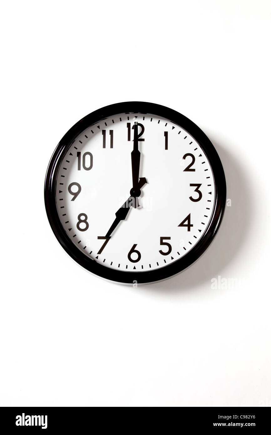 A clock set at 7 Stock Photo - Alamy
