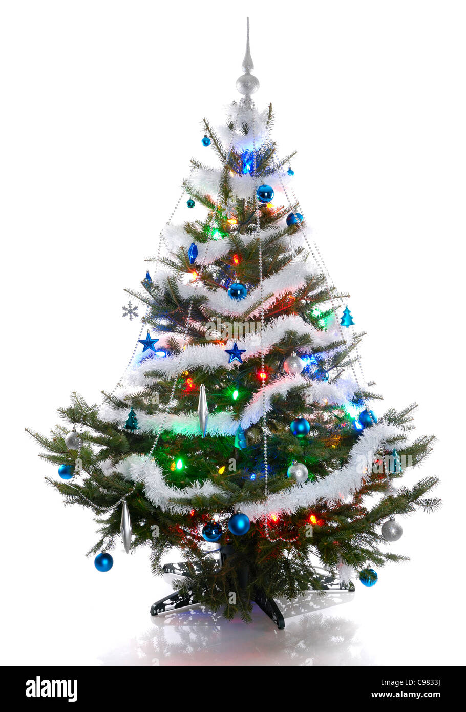 Decorated Christmas tree isolated on white background Stock Photo - Alamy