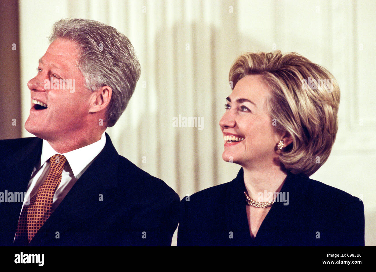 US President Bill Clinton and First Lady Hillary Clinton laugh as US ...