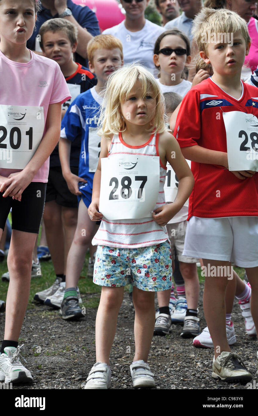 Children getting ready for a running race Stock Photo - Alamy