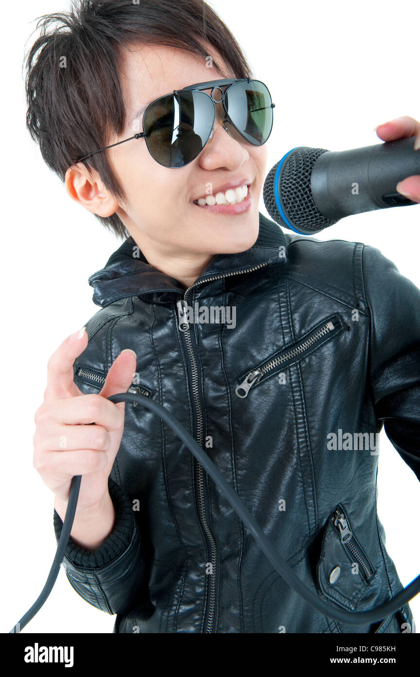 Asian rock singer in performance, isolated on white Stock Photo - Alamy