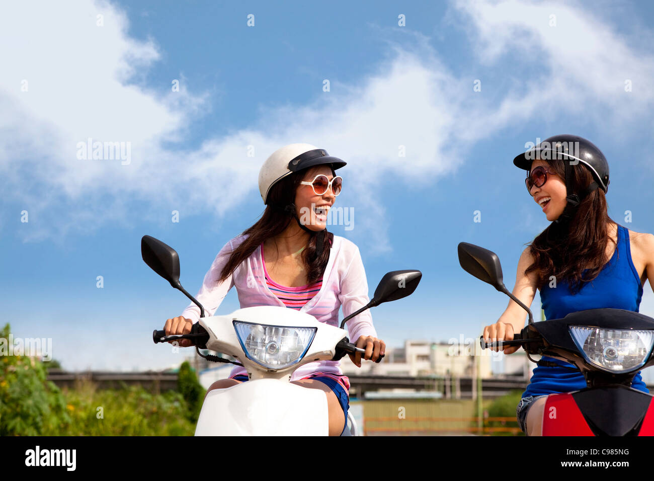 Asian teen girl riding bike hi-res stock photography and images - Alamy