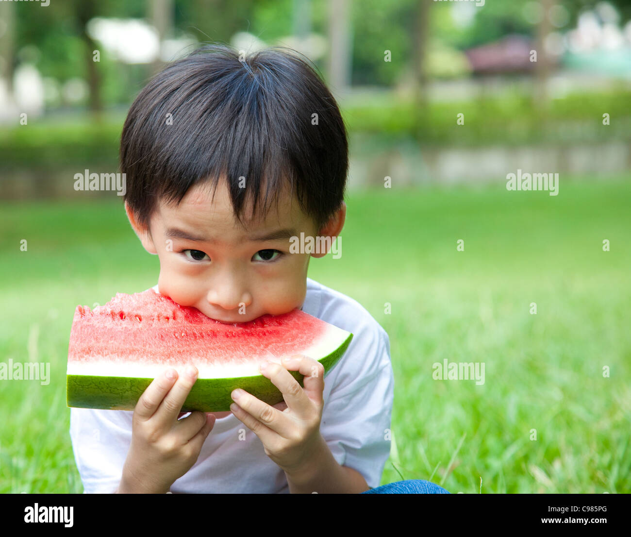 boy eating watermelon Stock Photo - Alamy
