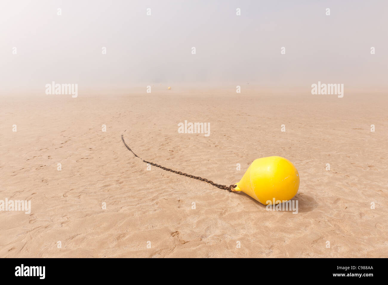 Sudden sea mist blown in from the Atlantic Ocean in summer makes a ...