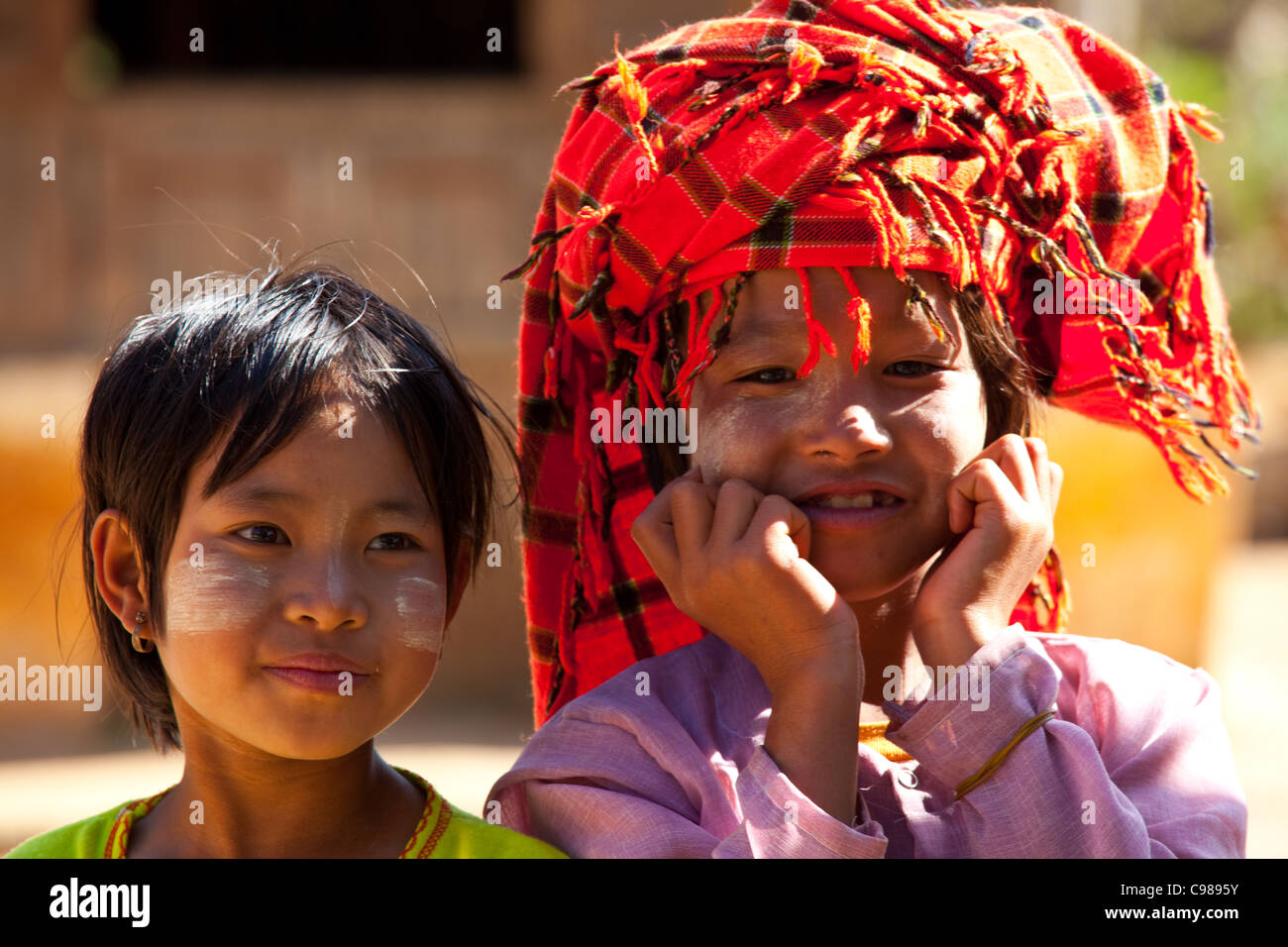 young girl with traditional thanakha on her face, in rural area, Shan ...