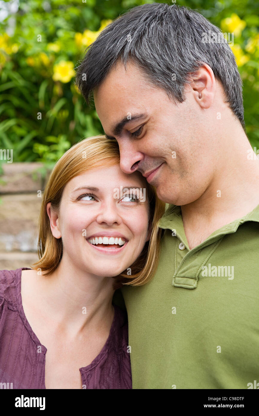 Mid adult couple smiling Stock Photo - Alamy