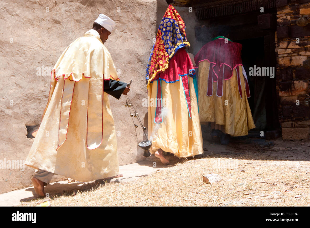 Orthodox Christian priests entering Abuna Aregawi Church to perform ...
