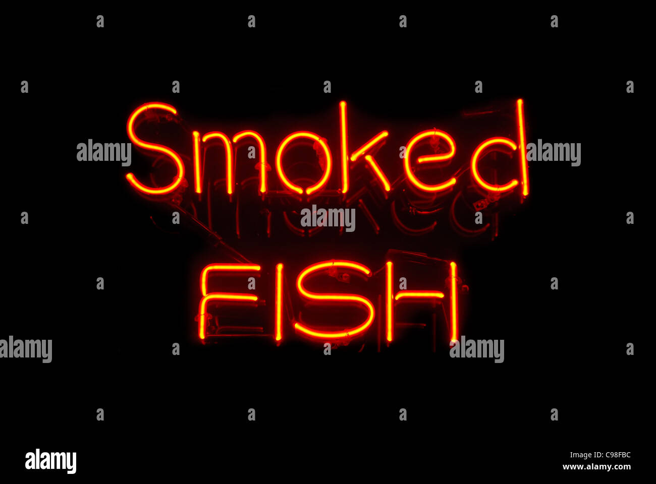 Smoked Fish neon sign isolated on black background Stock Photo - Alamy