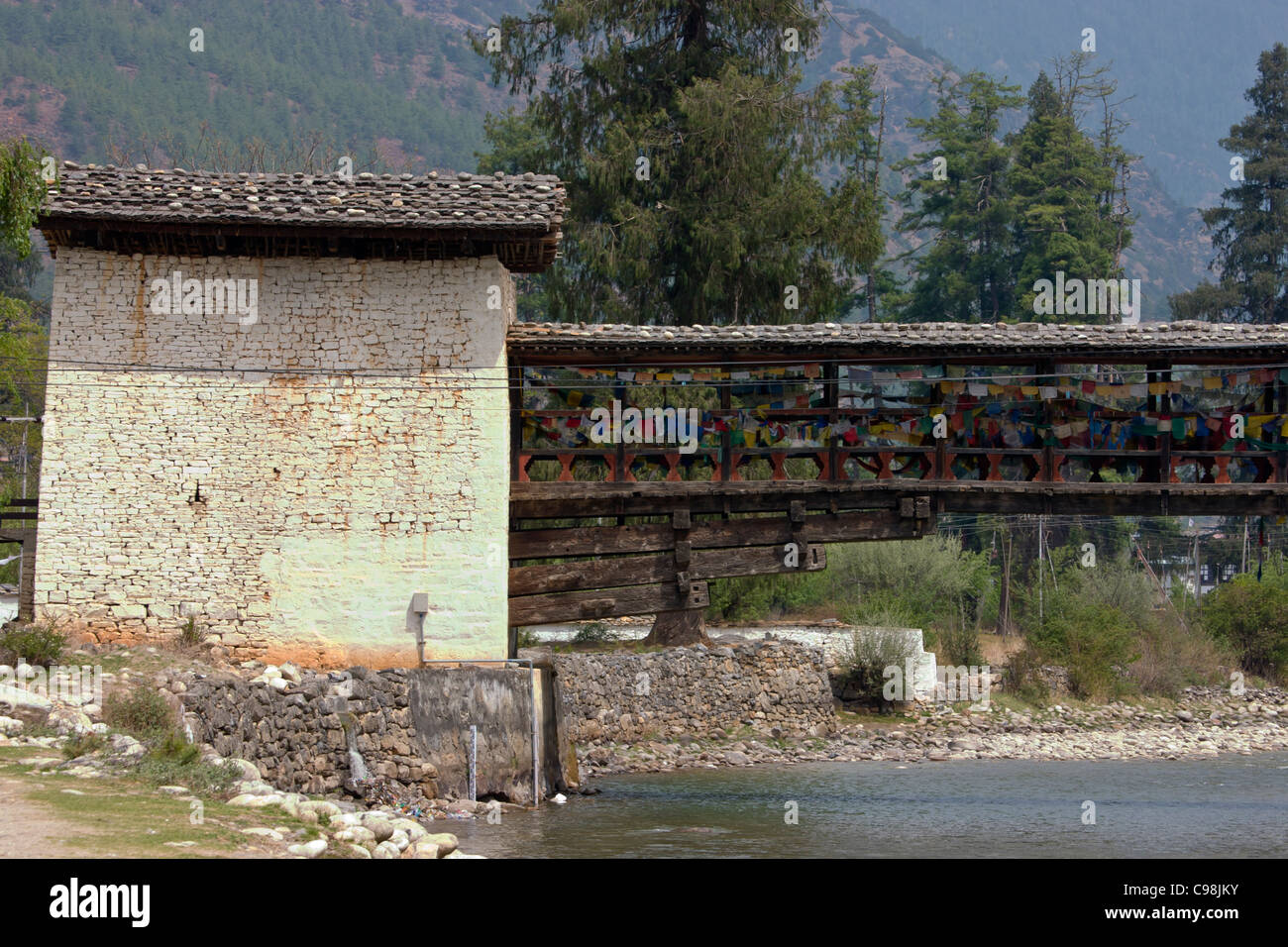 The bridge over the Paro river to the Paro Dzong Stock Photo - Alamy