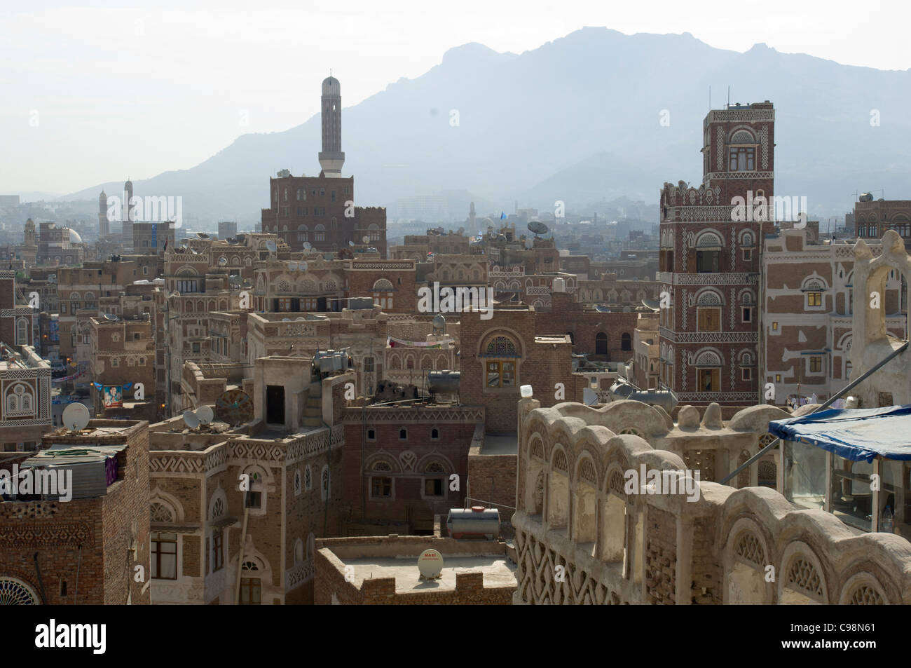 Looking across the rooftops of Old City of Sana'a, showing ancient ...