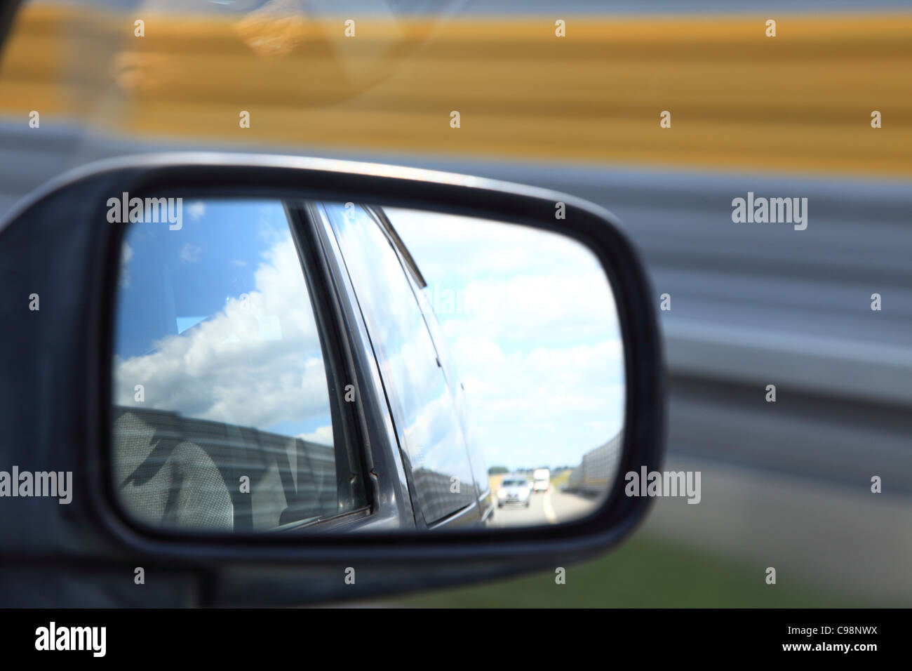 Road reflecting in the sideview mirror of a car Stock Photo - Alamy