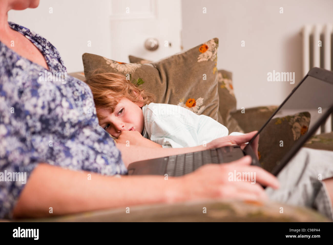 Mother son resting watching hi-res stock photography and images - Alamy