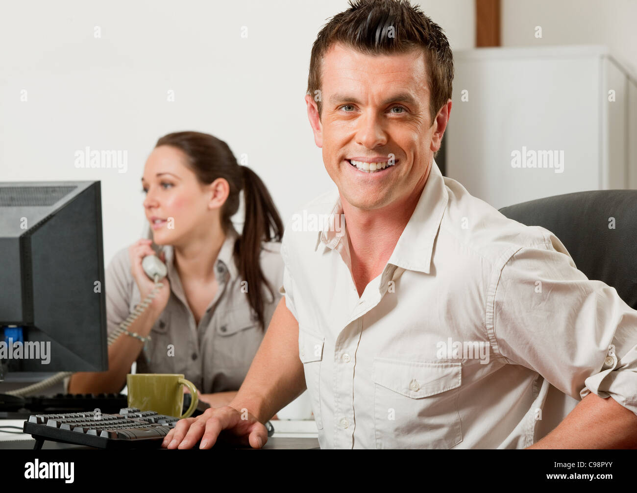 Man computer dark from behind hi-res stock photography and images - Alamy