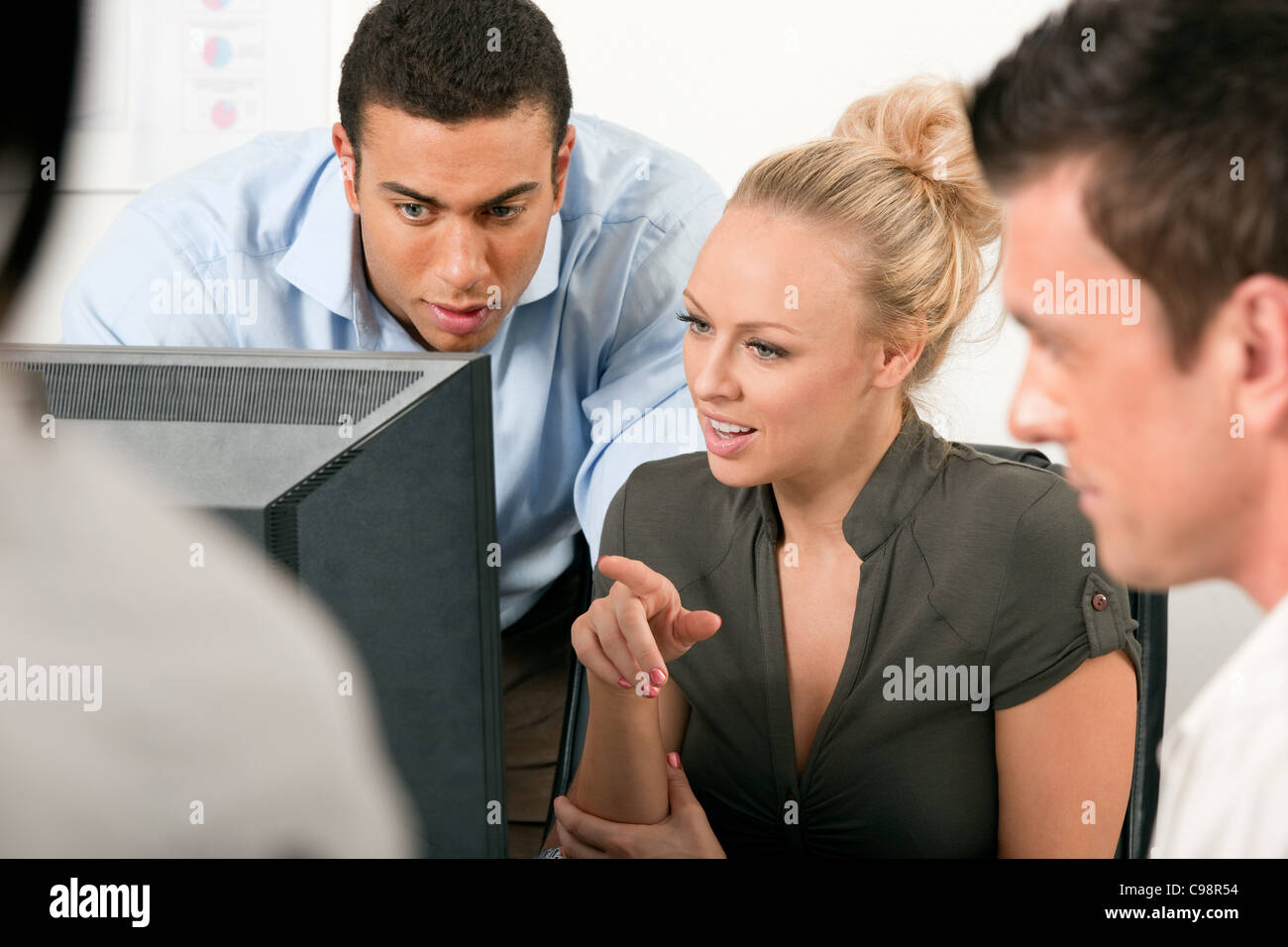 Woman asking colleague advice hi-res stock photography and images - Alamy
