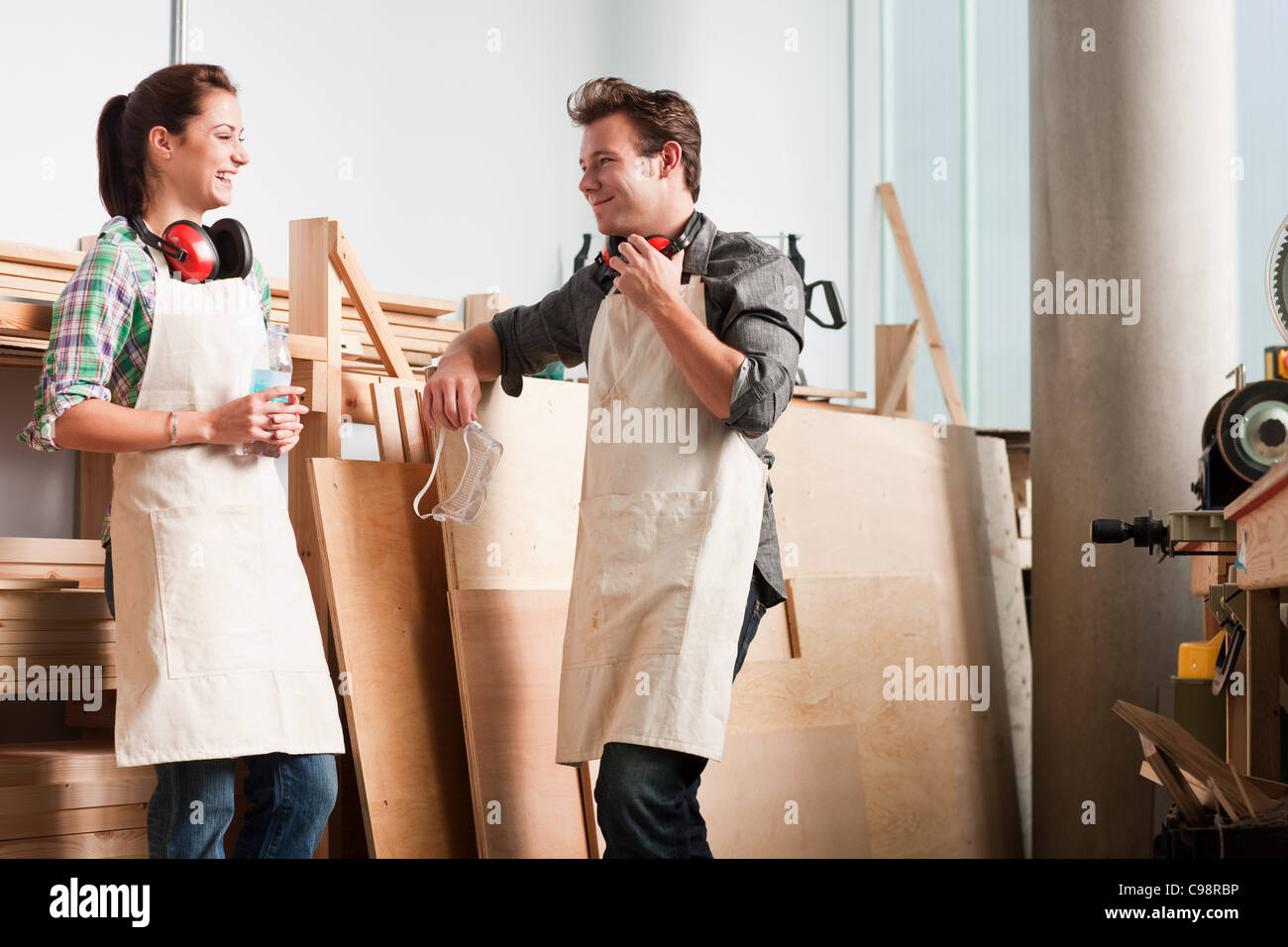 Team three male female carpenters hi-res stock photography and images ...