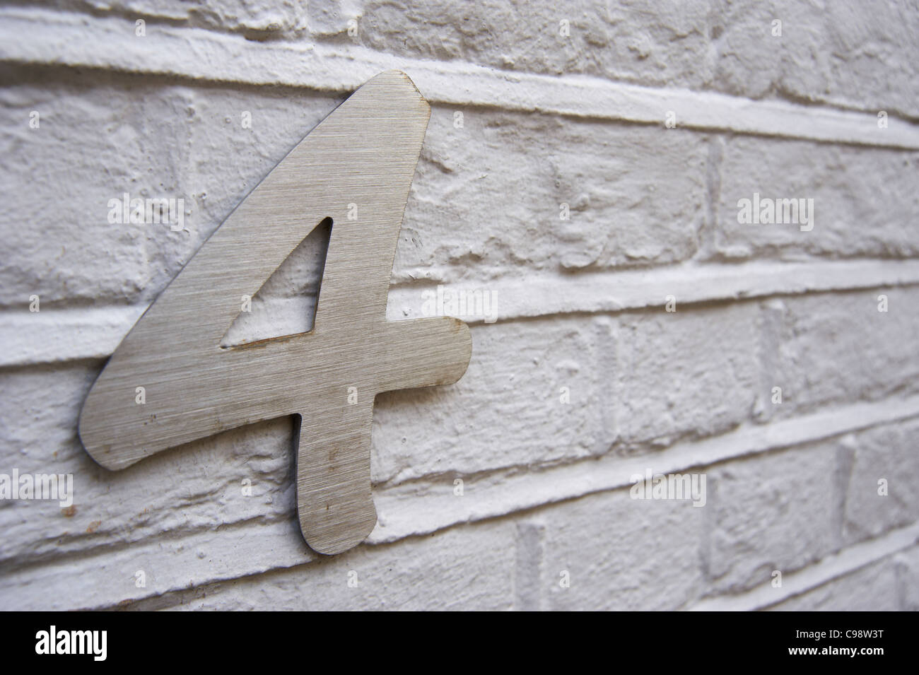 door house number 4 Stock Photo - Alamy
