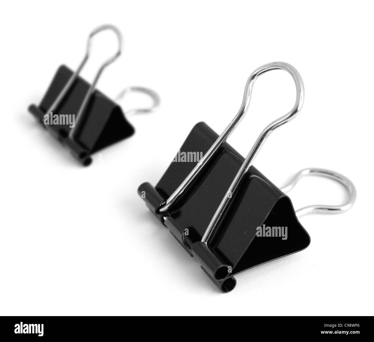 Paper clip on table Cut Out Stock Images & Pictures - Alamy