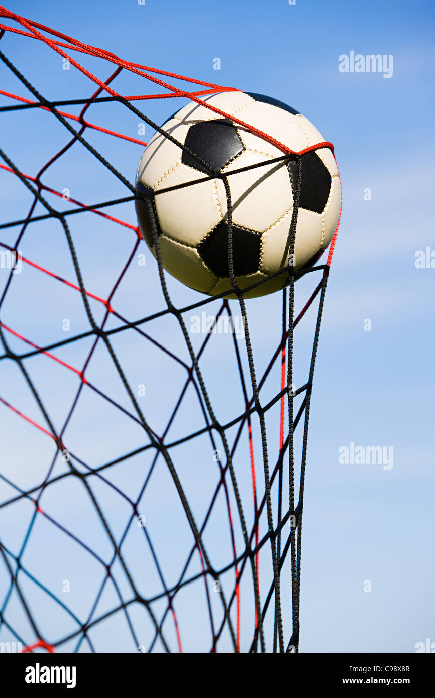Football in goal Stock Photo - Alamy