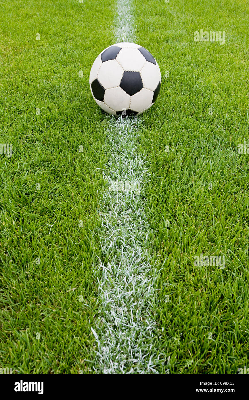 Football on pitch Stock Photo - Alamy