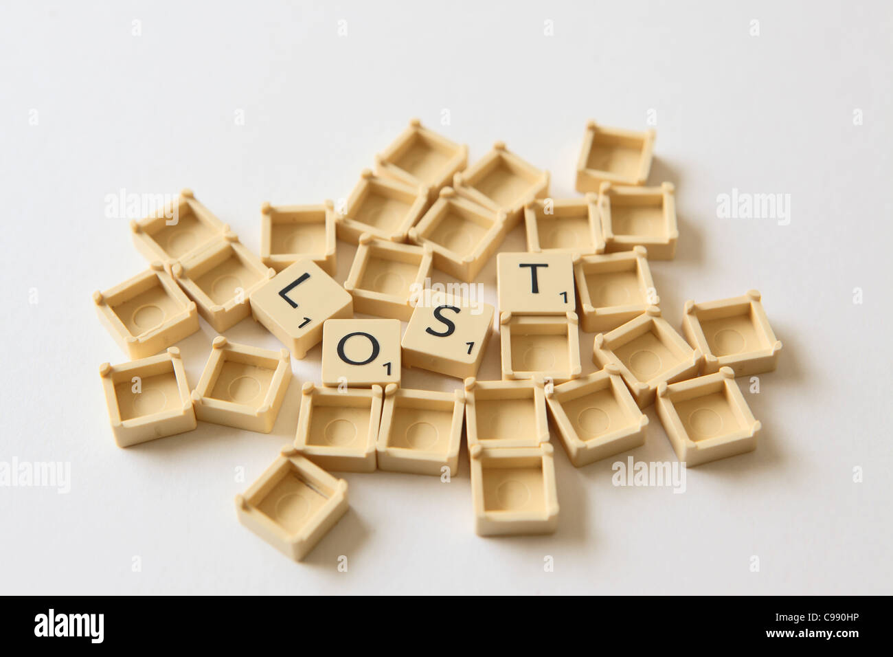 Spelling spell out with scrabble tiles hi-res stock photography and ...