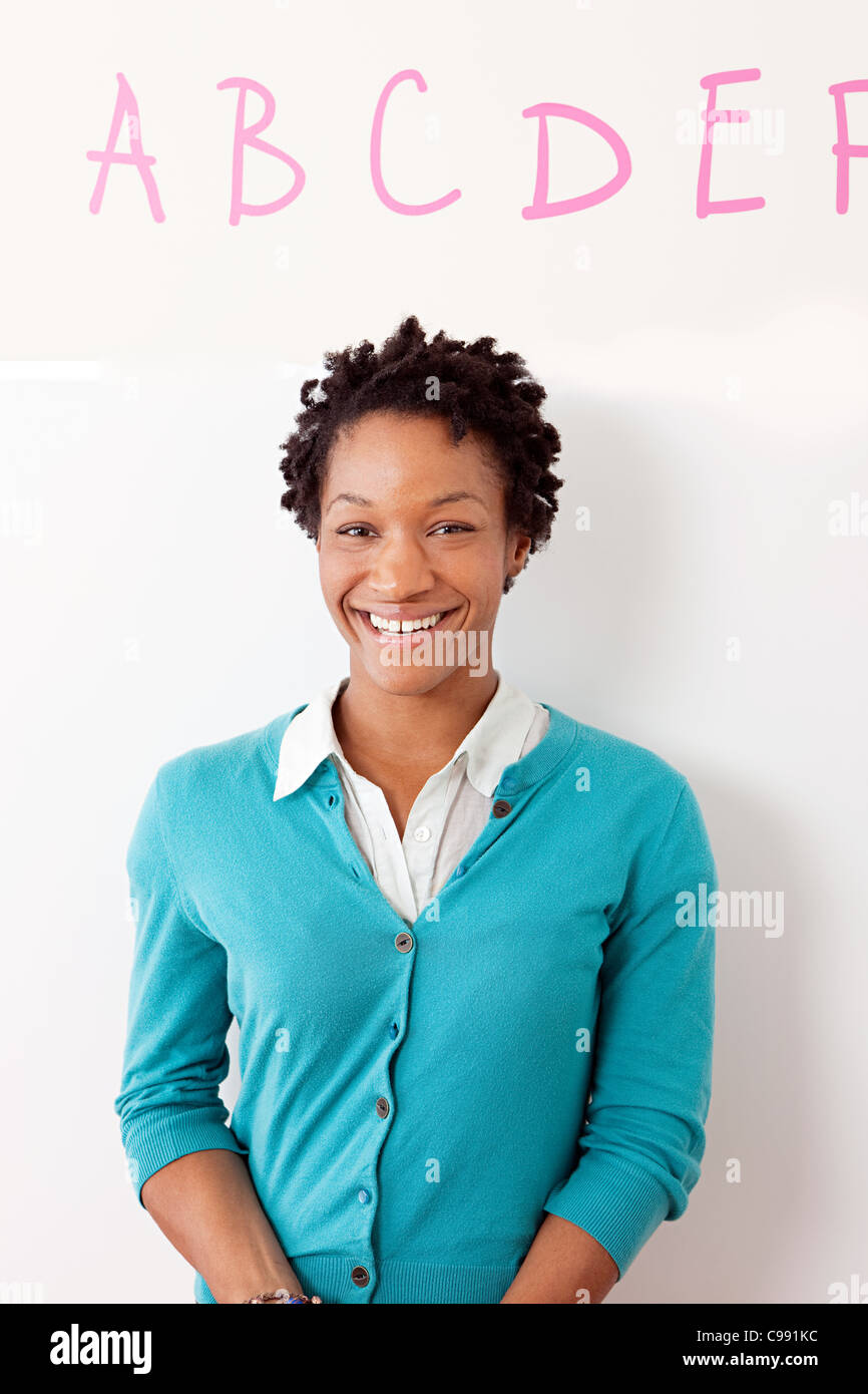 Portrait of a female preschool teacher Stock Photo - Alamy