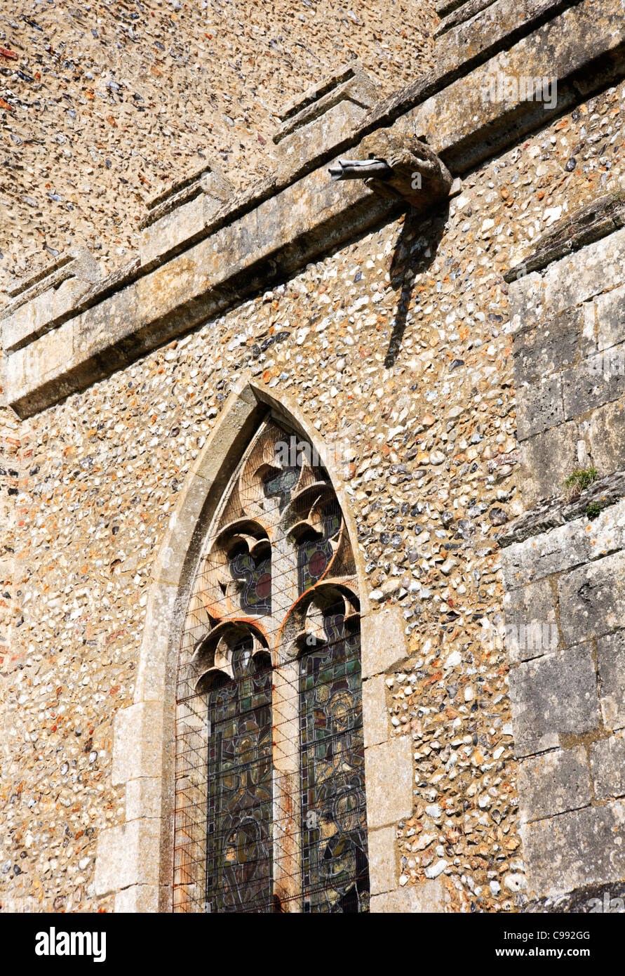 Nave window and gargoyle at the parish church of St Mary the Virgin at ...