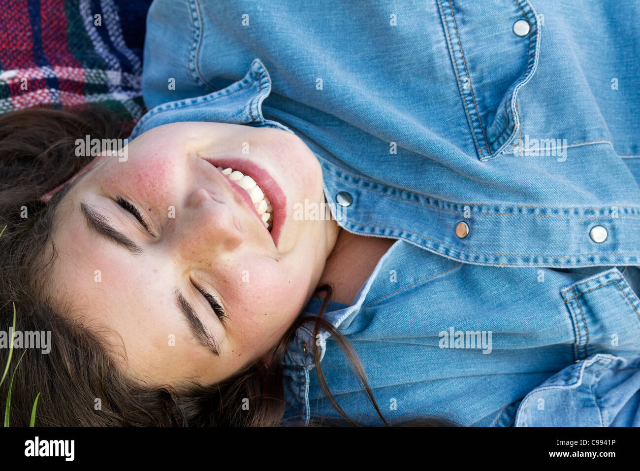Pretty girl sleeping with a smile, summer close-up Stock Photo - Alamy