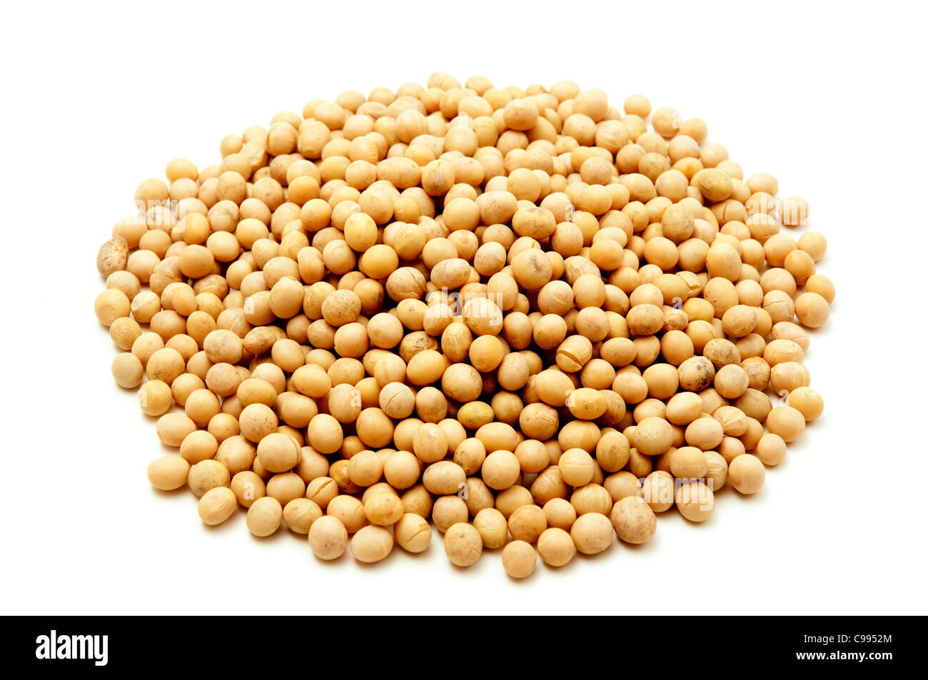 Yellow soybeans on a white background Stock Photo - Alamy