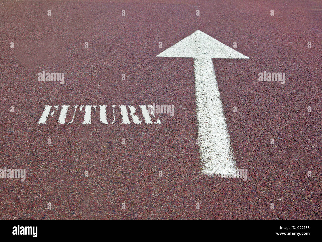an arrow on the asphalt showing the future direction Stock Photo - Alamy