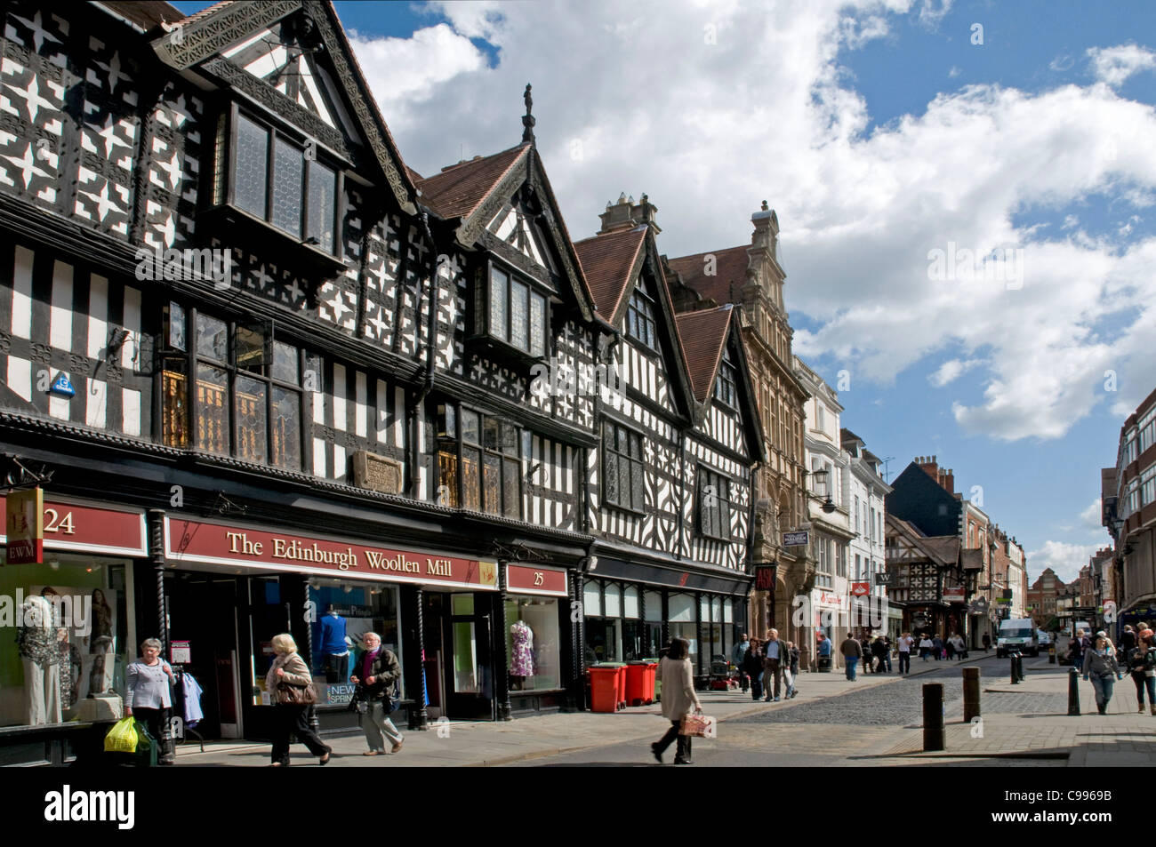 The high street tudor style buildings and shops hi-res stock ...