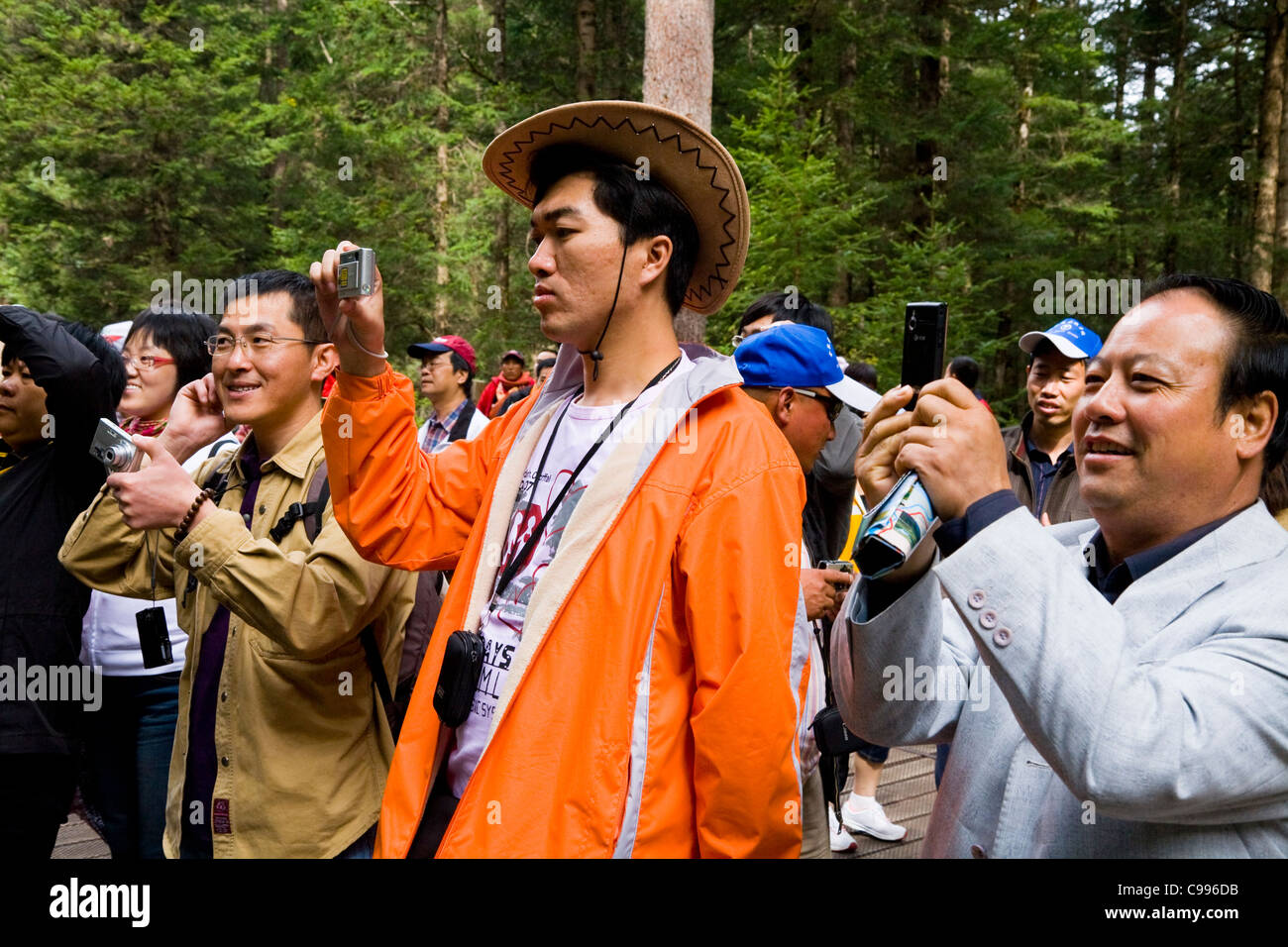 Chinese middle class tourist photographers / tourists taking photo ...