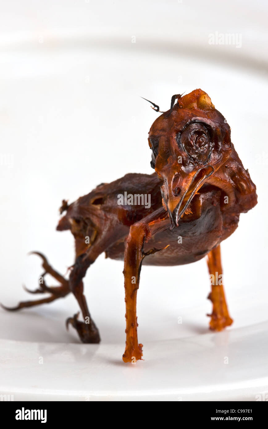 Fried Bird as sold at market in Phnom Penh Cambodia - An example of the ...
