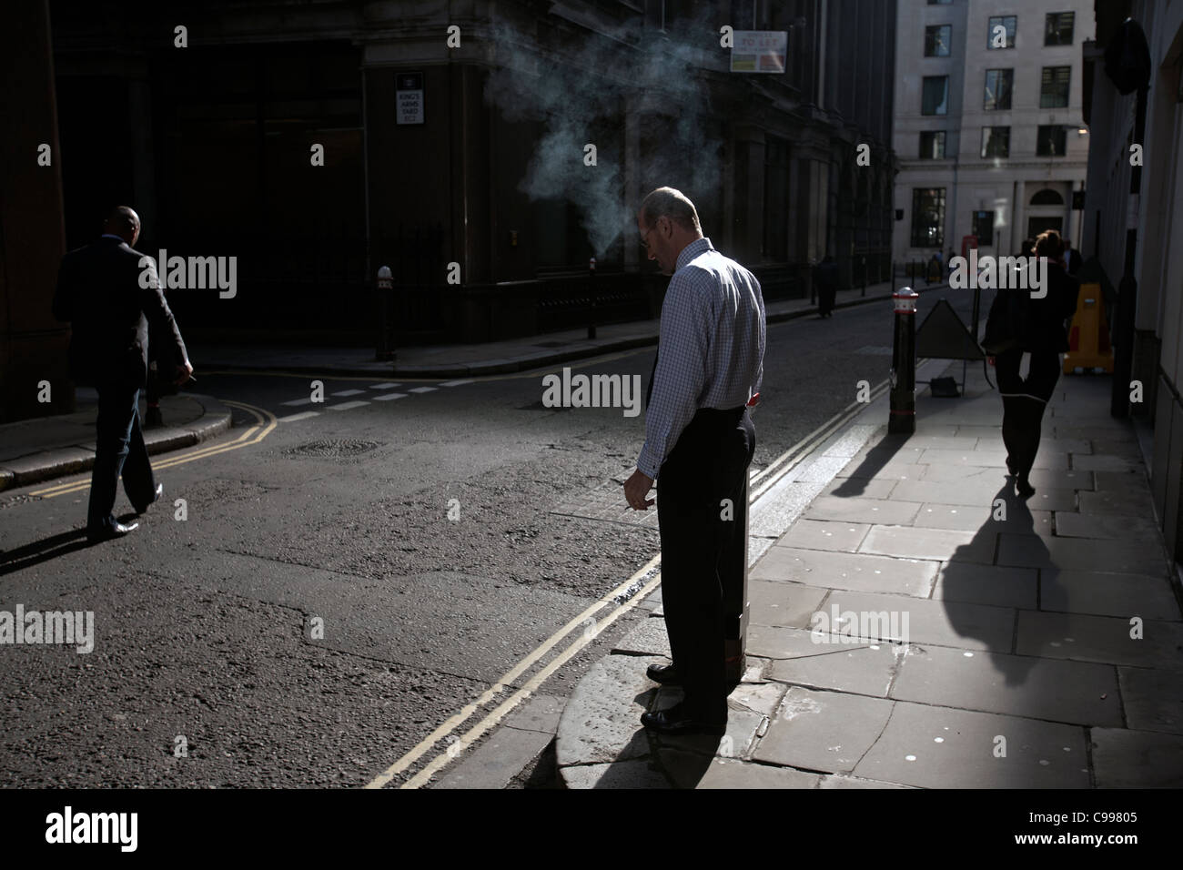 Man smoking in walk hi-res stock photography and images - Alamy