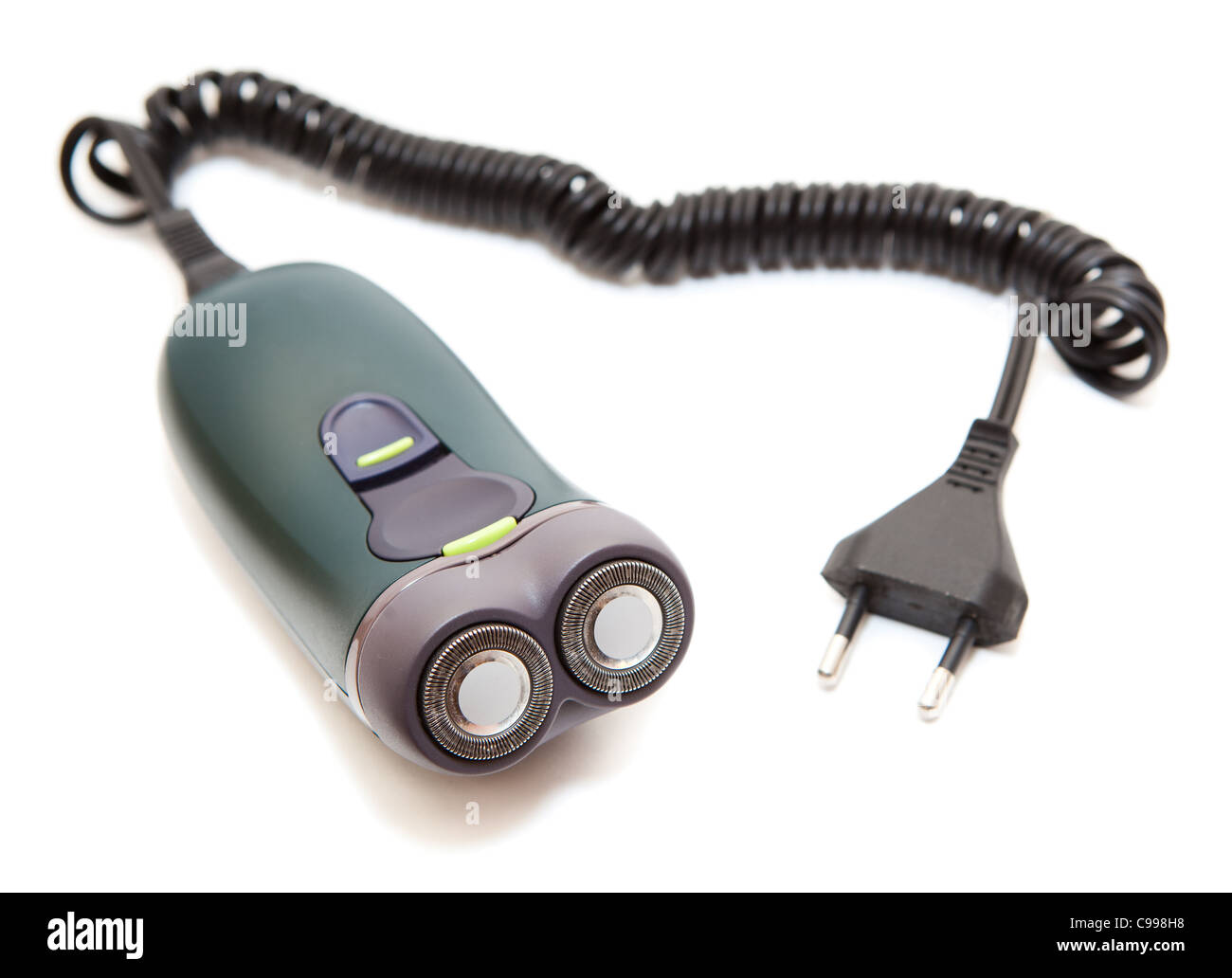 Electric shave isolated on a white background with wire Stock Photo - Alamy