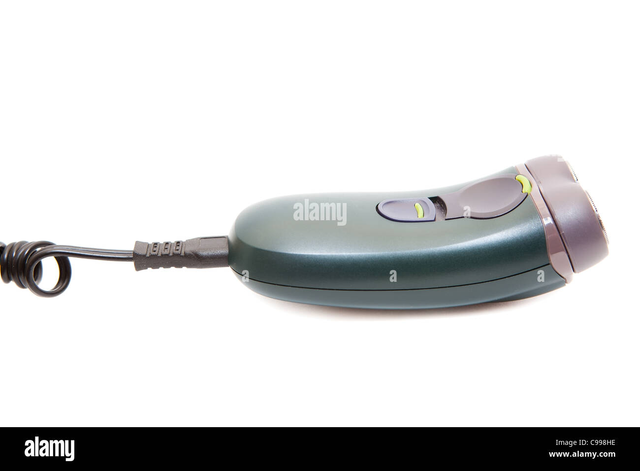 Electric shave isolated on a white background with wire Stock Photo - Alamy