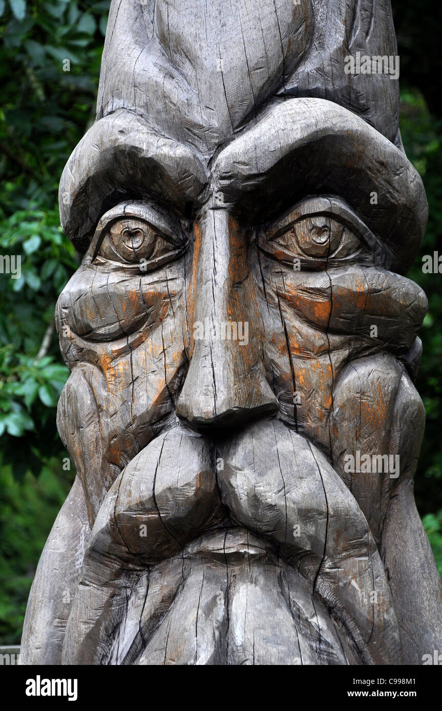 A wooden sculpture of a man's face. UK Stock Photo - Alamy